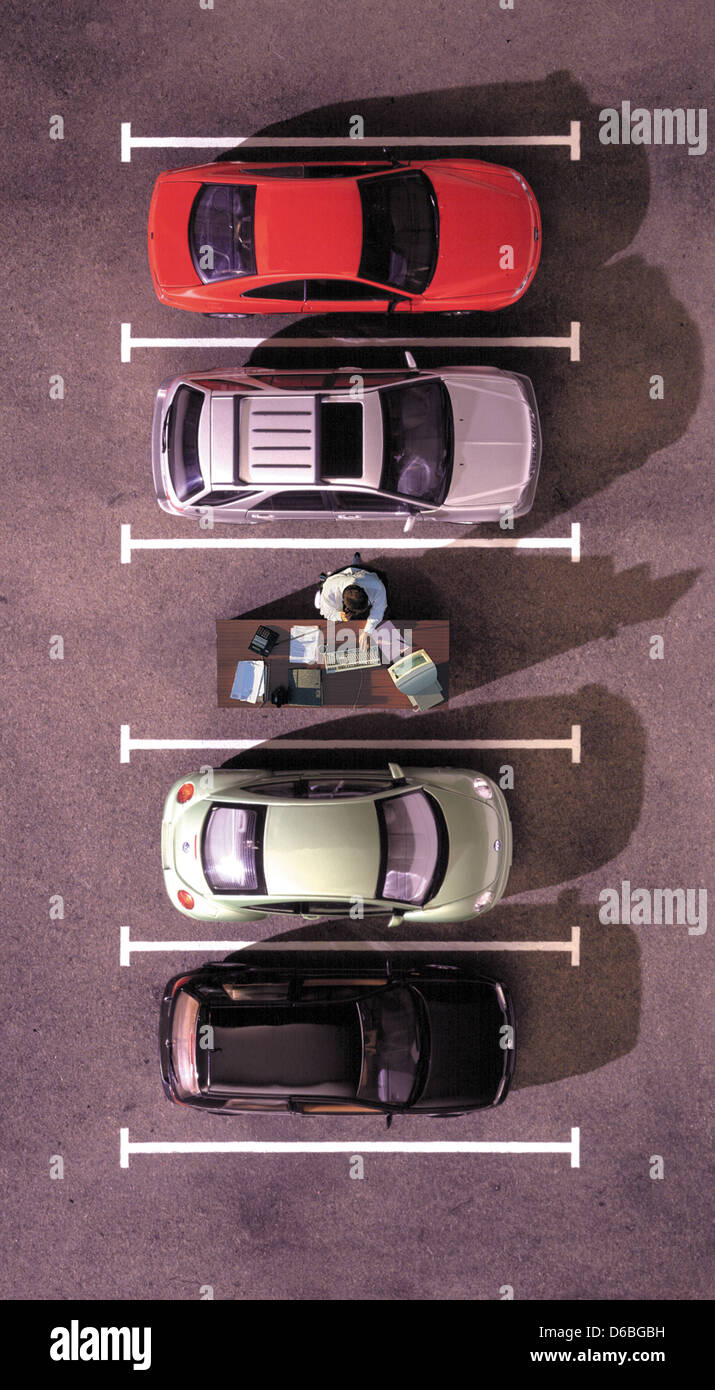 Overhead view of desk in parking lot Stock Photo - Alamy