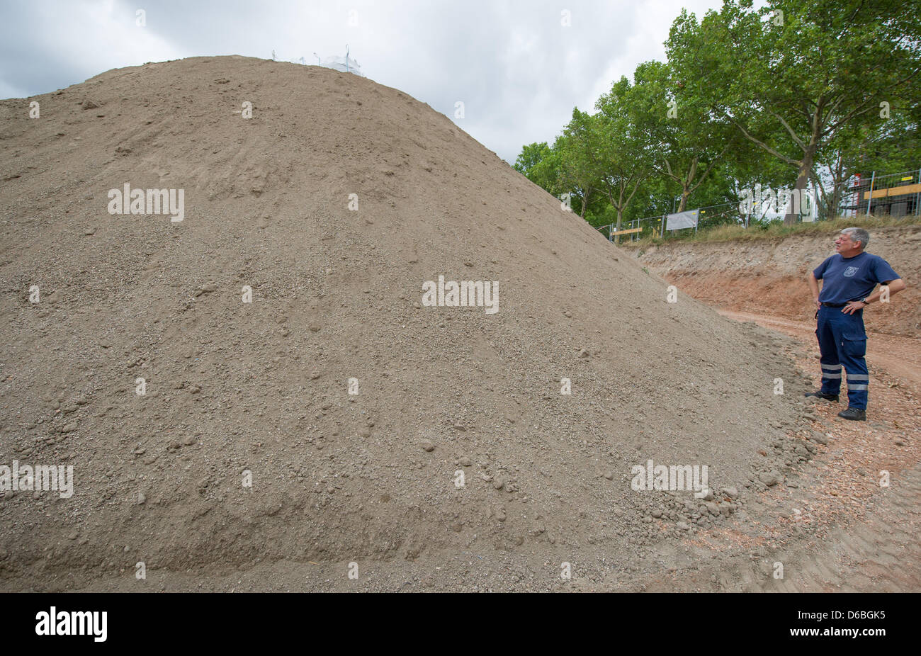 Bomb disposer Frank Bender looks at a hill of sand under which a 500kg ...