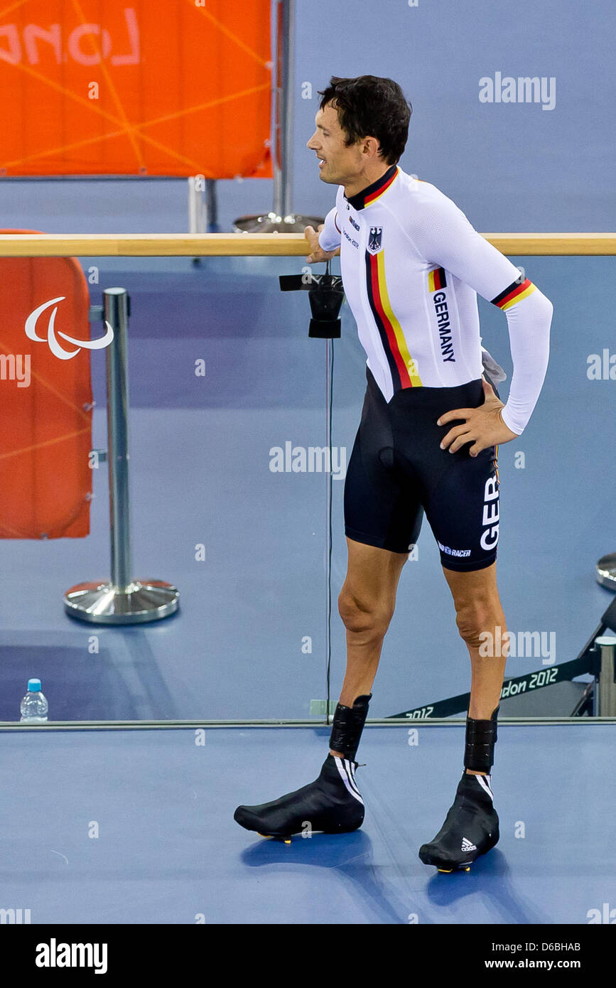 Michael Teuber of Germany stands at the side of the track after the Men ...