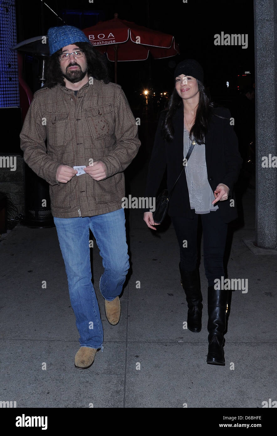 Adam Duritz from the band Counting Crows and female companion are seen ...