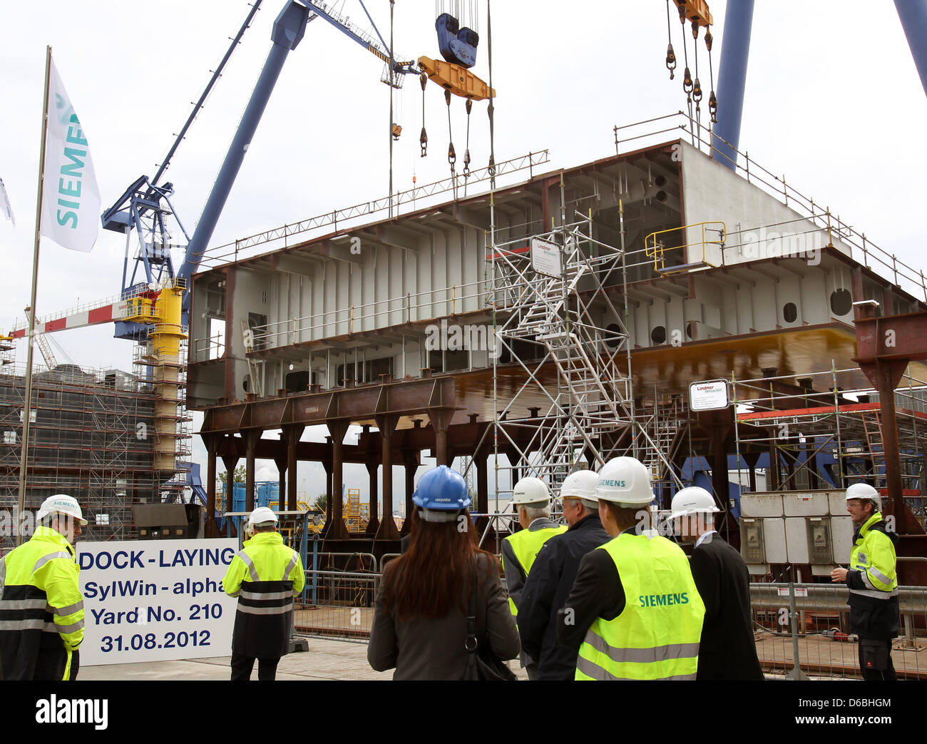 The dock-laying is underway for the SylWin Alpha transformer platform ...