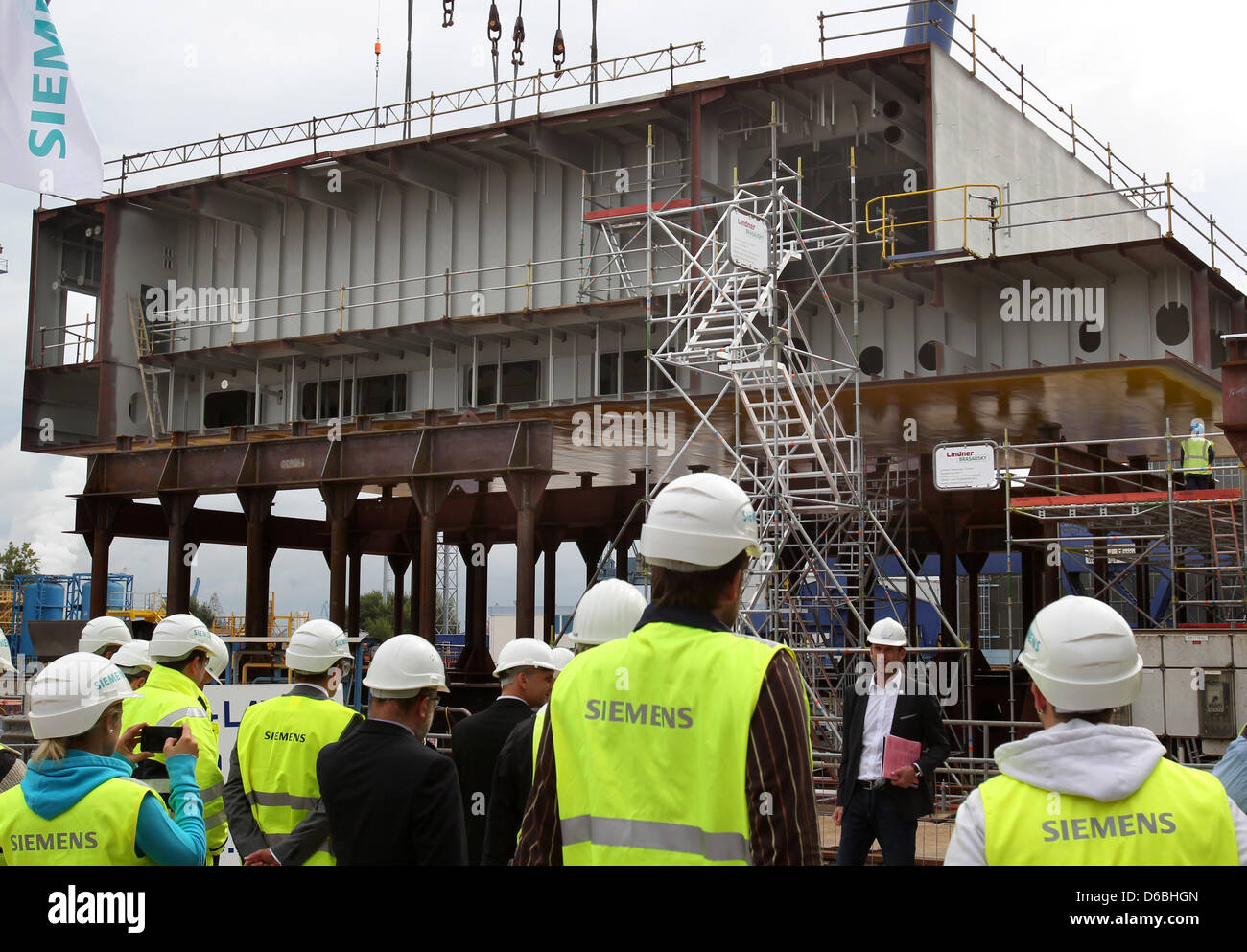 The dock-laying is underway for the SylWin Alpha transformer platform ...