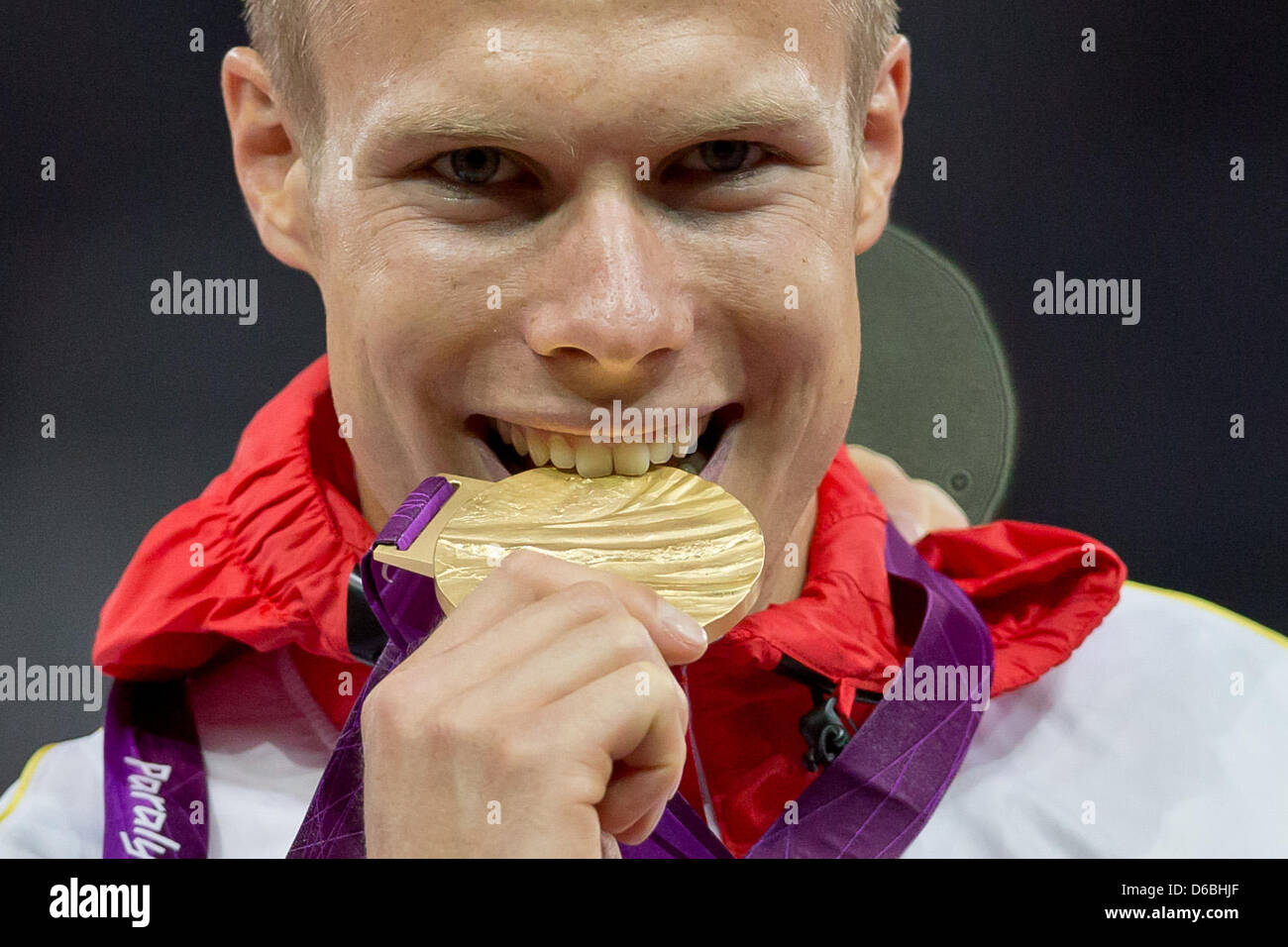 Gold medalist Markus Rehm of Germany celebrates after the men's long ...