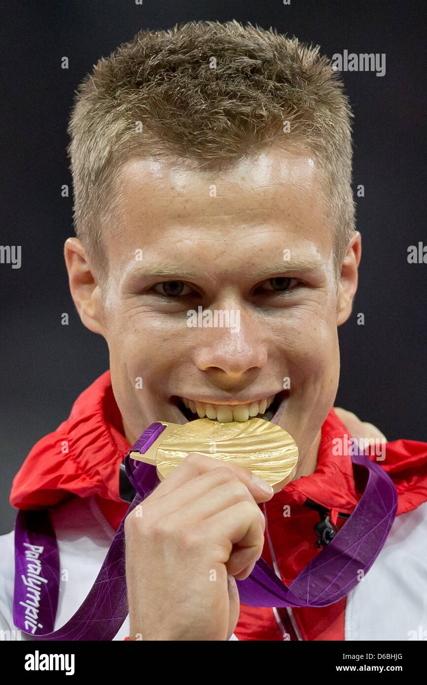 Gold medalist Markus Rehm of Germany celebrates after the men's long ...