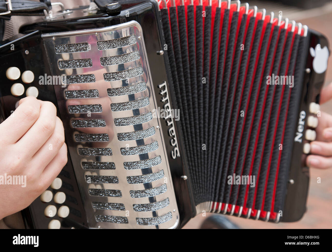 Accordion being played Stock Photo - Alamy