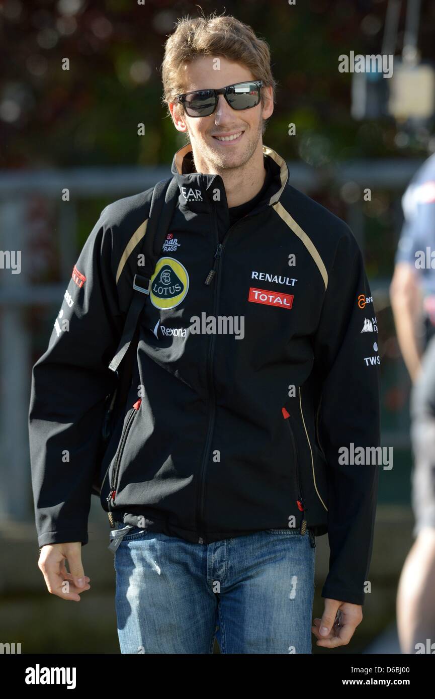 French Formula One driver Romain Grosjean of Lotus arrives the paddock ...