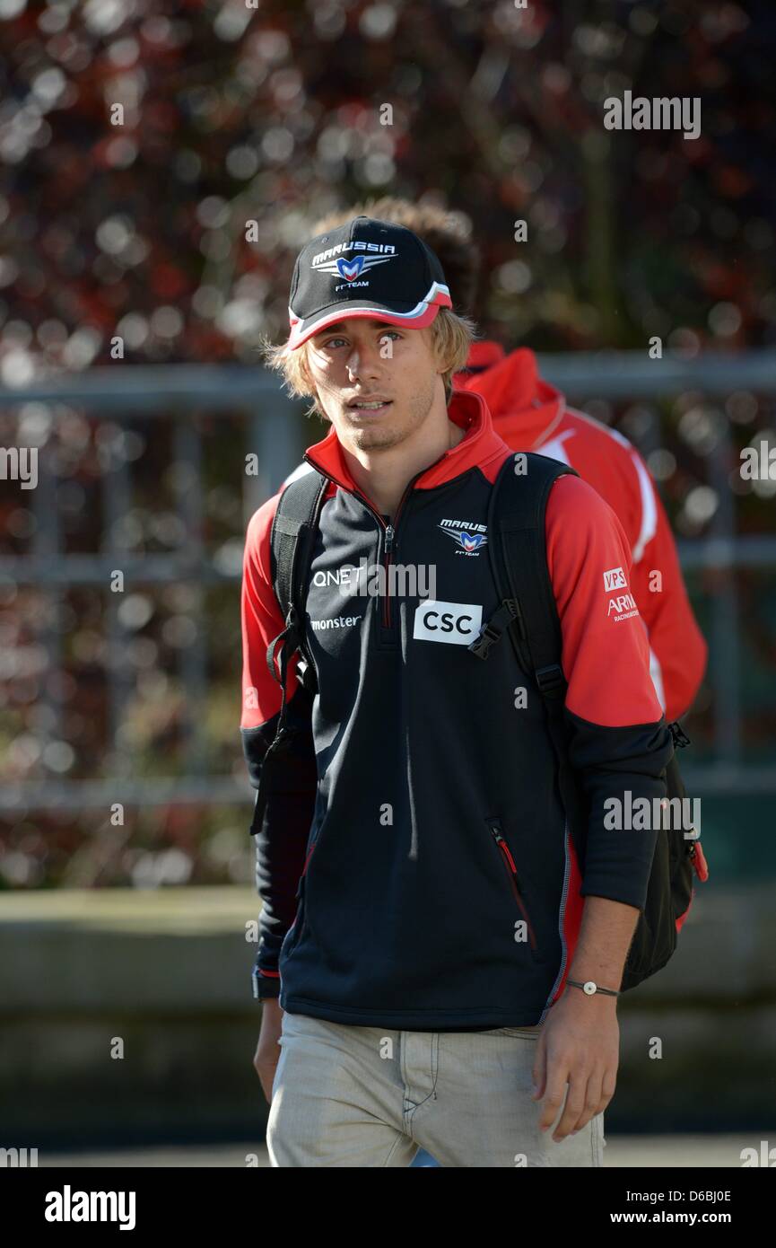 French Formula One driver Charles Pic of Marussia arrives the paddock ...