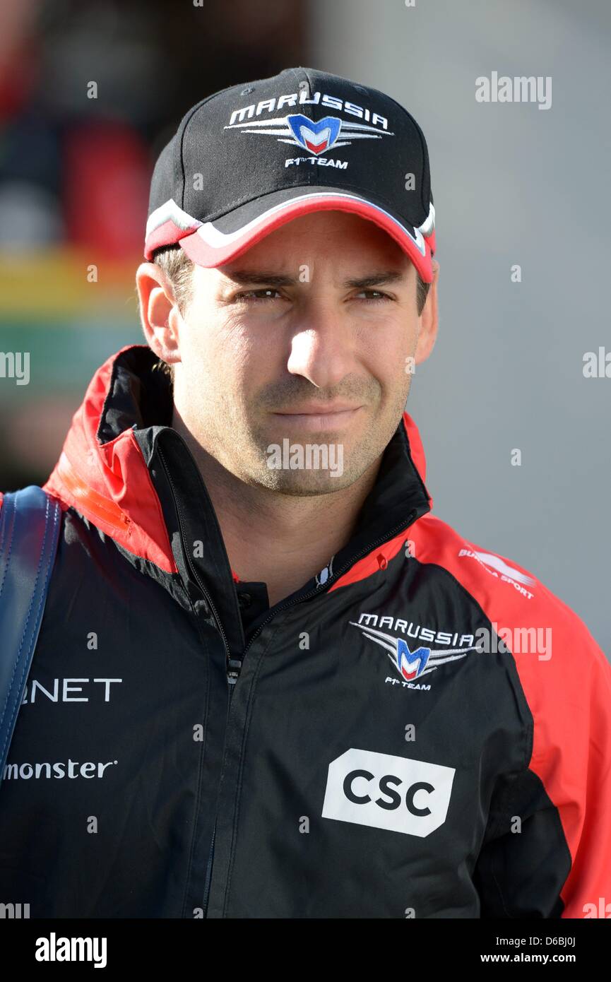 German Formula One driver Timo Glock of Marussia arrives the paddock at ...