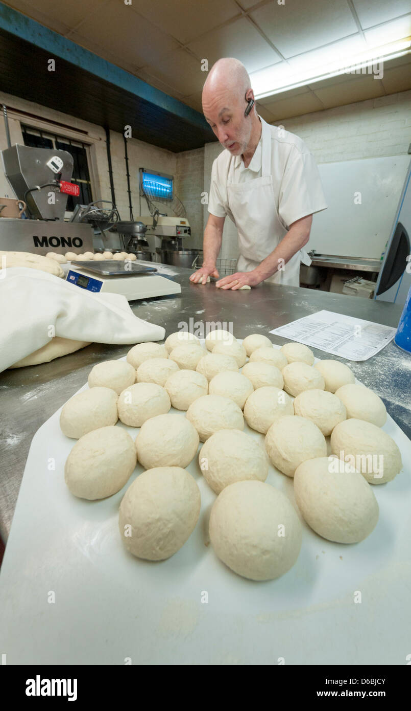 Cambridge, UK. 16th April, 2013. Alan Ackroyd bakes fresh bread at ...