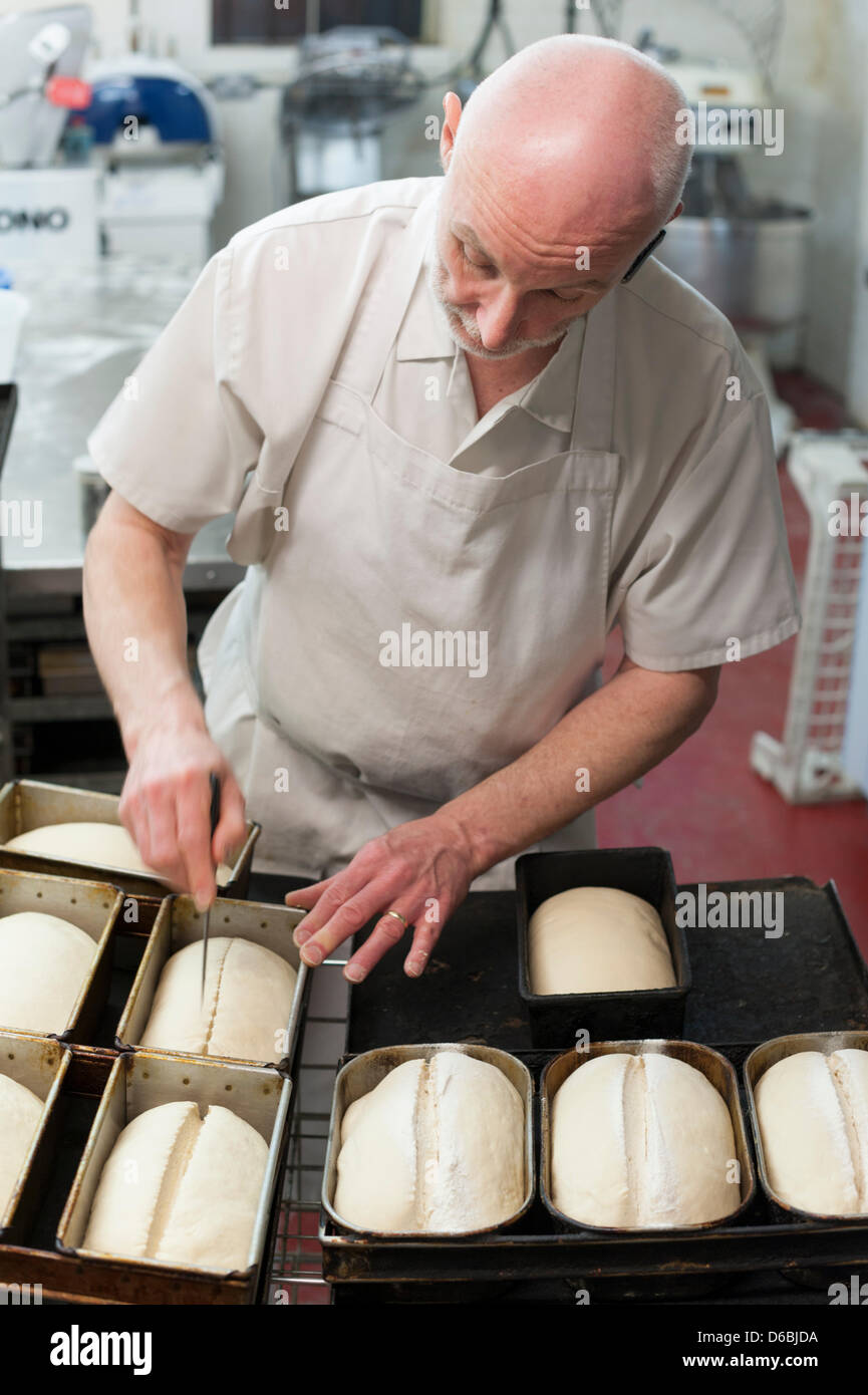 Cambridge, UK. 16th April, 2013. Alan Ackroyd bakes fresh bread at ...