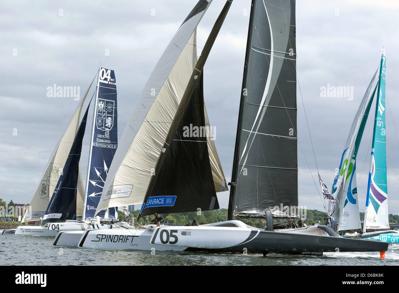 MOD70 trimaran boats compete in their fourth race of the 2012 Betfair ...