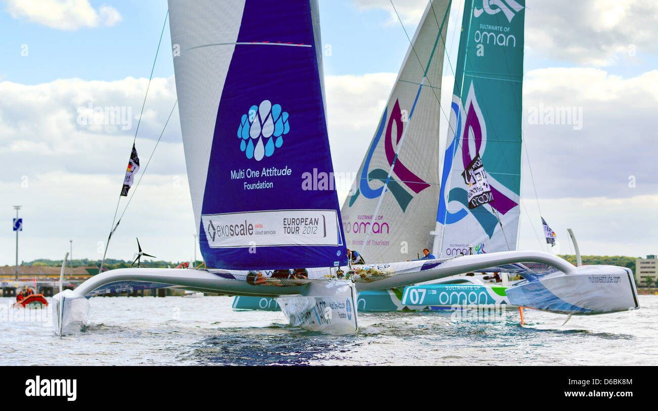 The MOD70 trimaran boats 'Race for Water' (L) and 'Musandam Oman Sail ...