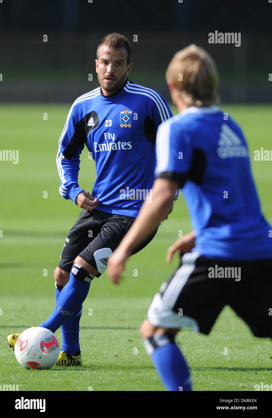 Dutch soccer player Rafael van der Vaart (L) takes part in a training ...