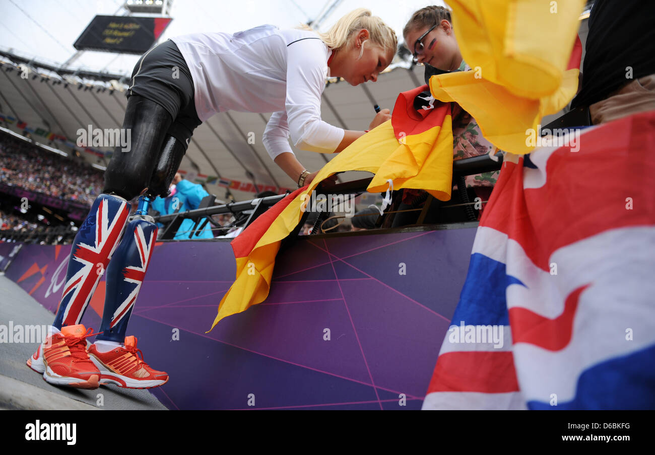 Vanessa Low of Germany signs autographs wearing her "Union Jack ...