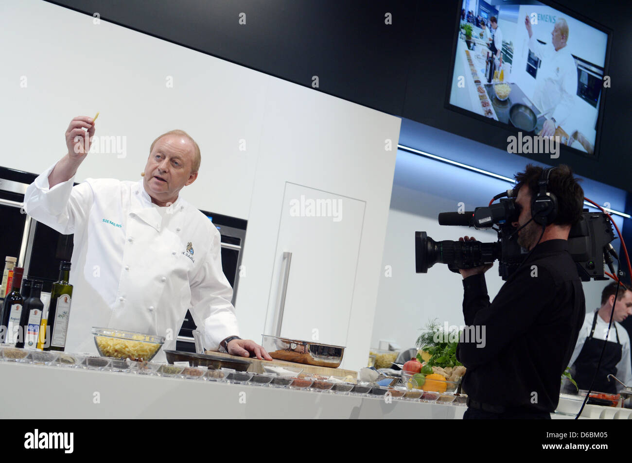 German television chef Alfons Schuhbeck shows his cooking skills at the ...