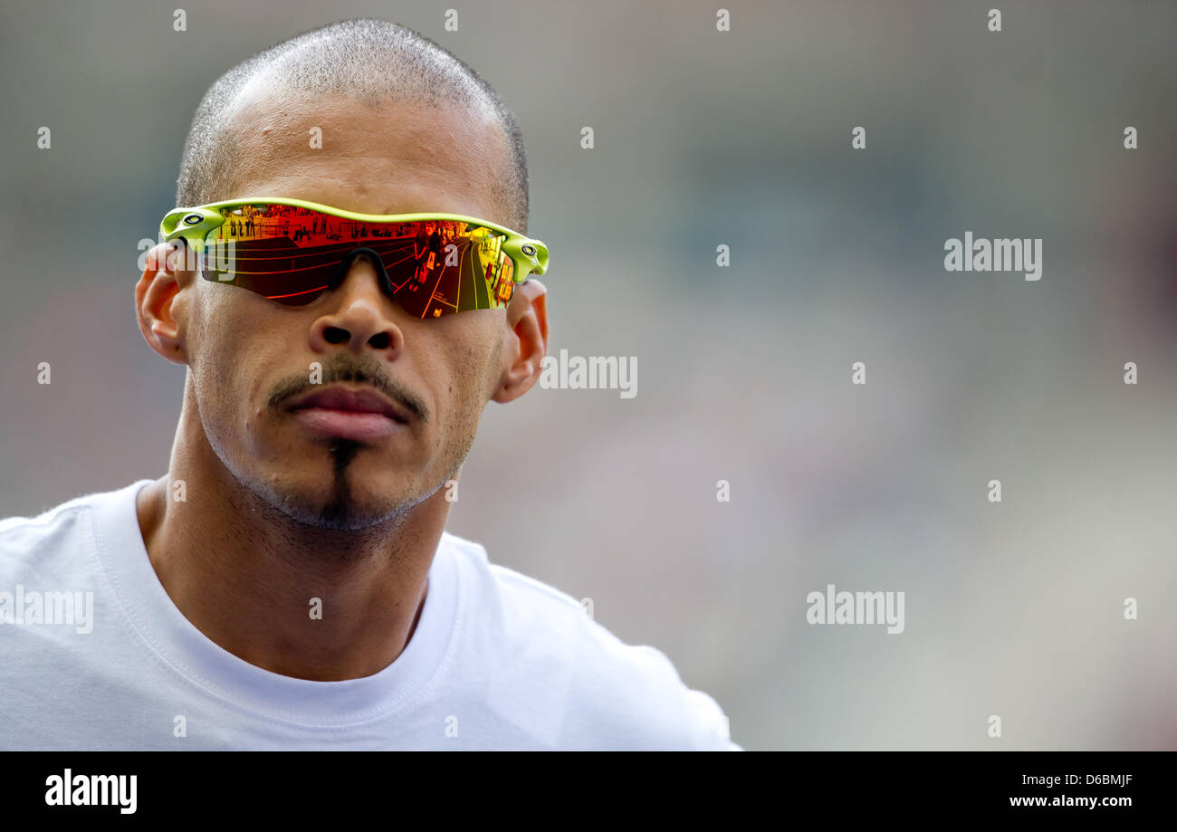 Hurdler Felix Sanchez of the Dominican Republic awaits the start of the ...