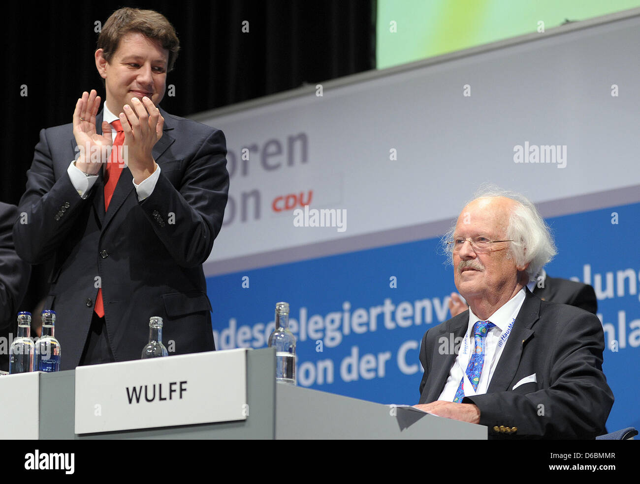 Chairman of the Young Union, Philipp Missfelder (L), applauds the ...