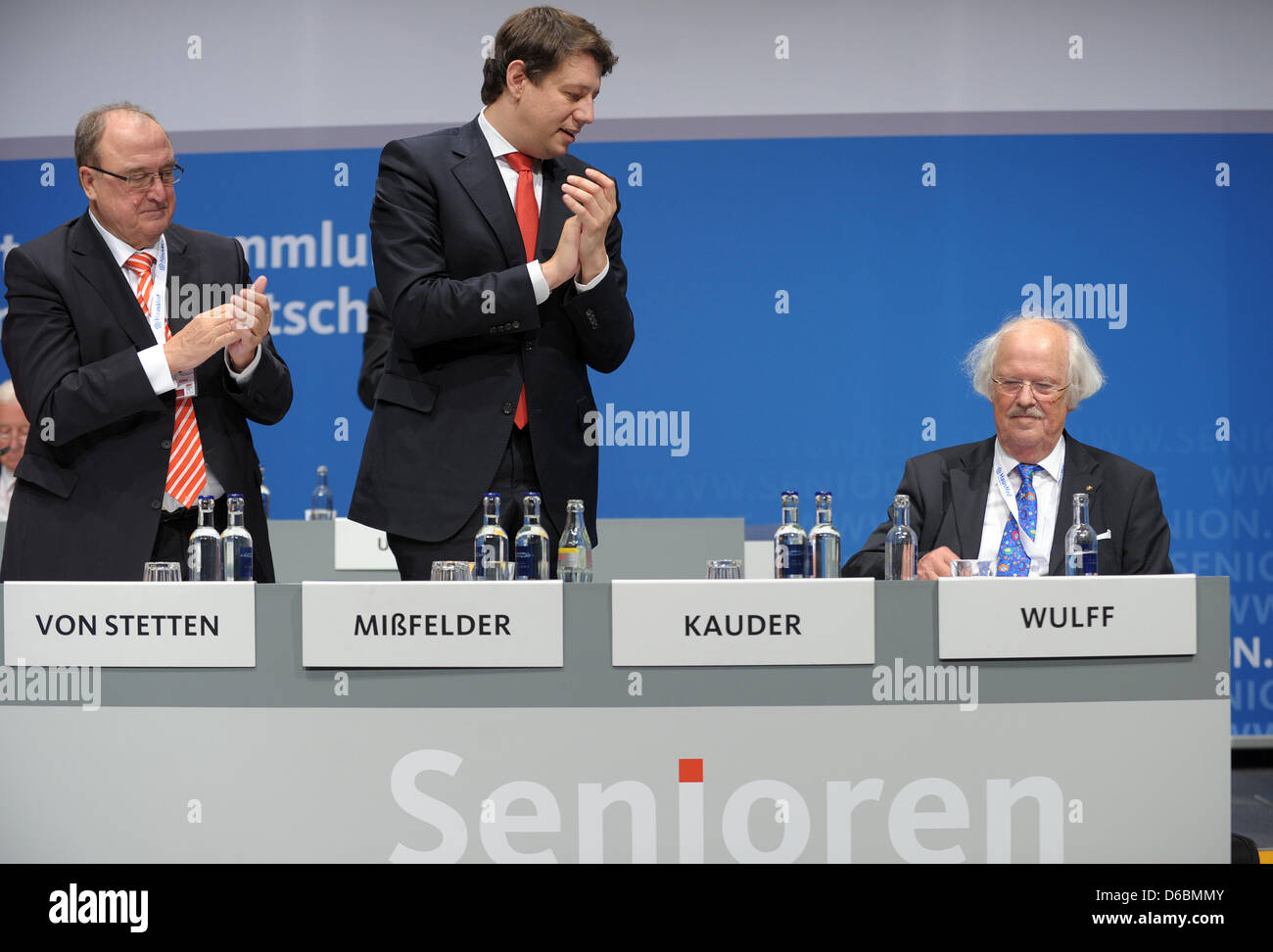 Chairman of the Young Union, Philipp Missfelder (C), applauds the ...