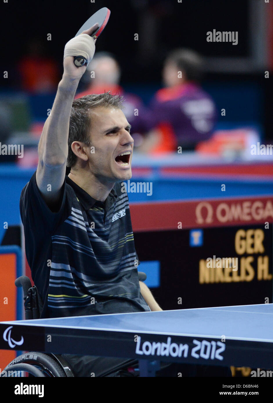 Holger Nikelis of Germany reacts after men's singles class 1 final ...