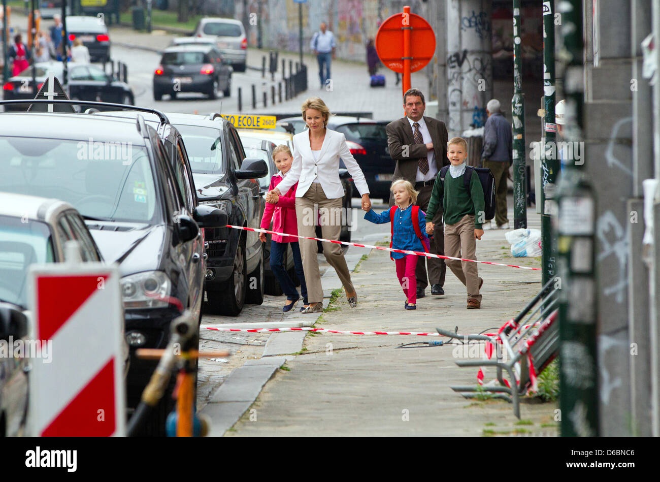 Princess Mathilde of Belgium (2-L) arrives with her children, Princess ...