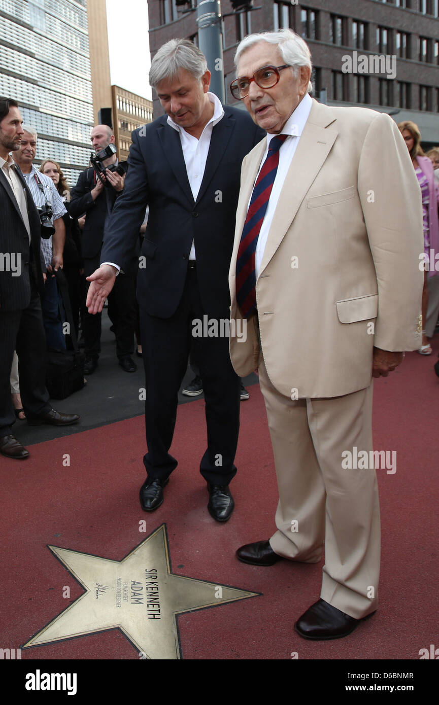 Scenographer Sir Kenneth Adam (R) and mayor Klaus Wowereit (L) present ...