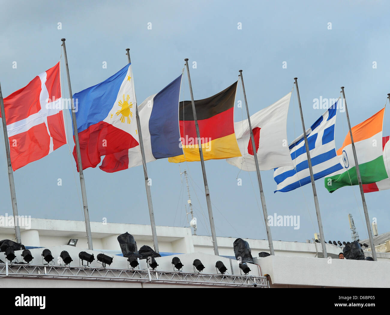 Flags of several countries fly outside the Palazzo del Cinema during ...