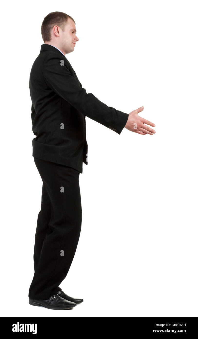 Side view of businessman in black suit. Man is going to handshake ...