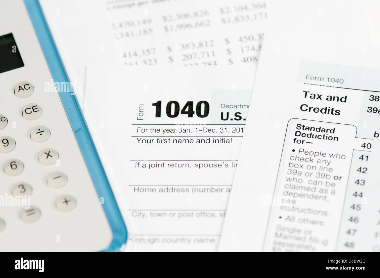 Tax form 1040 for US individual tax return with calculator Stock Photo ...