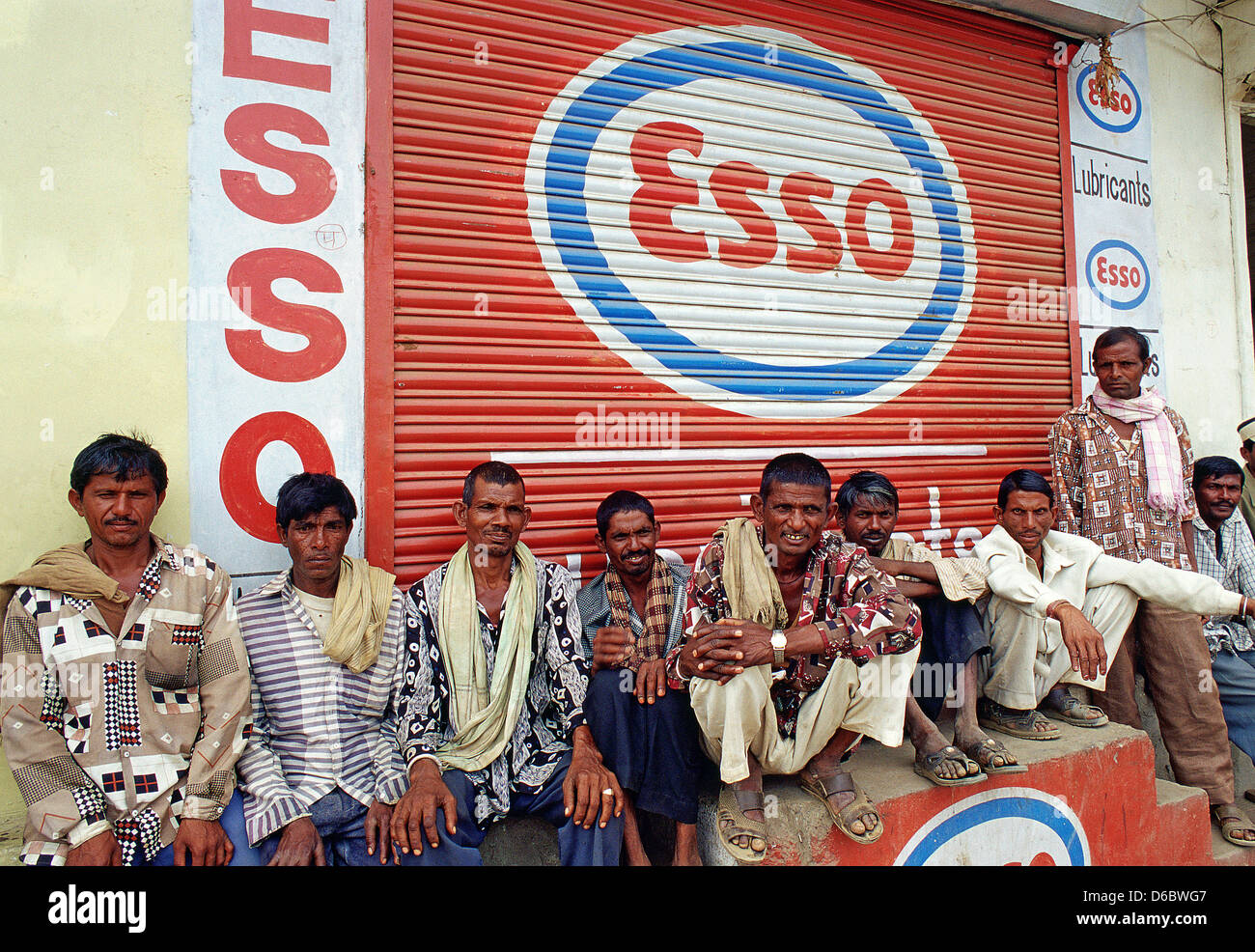 Under an advertisement for the multinational company Esso, Indian day ...