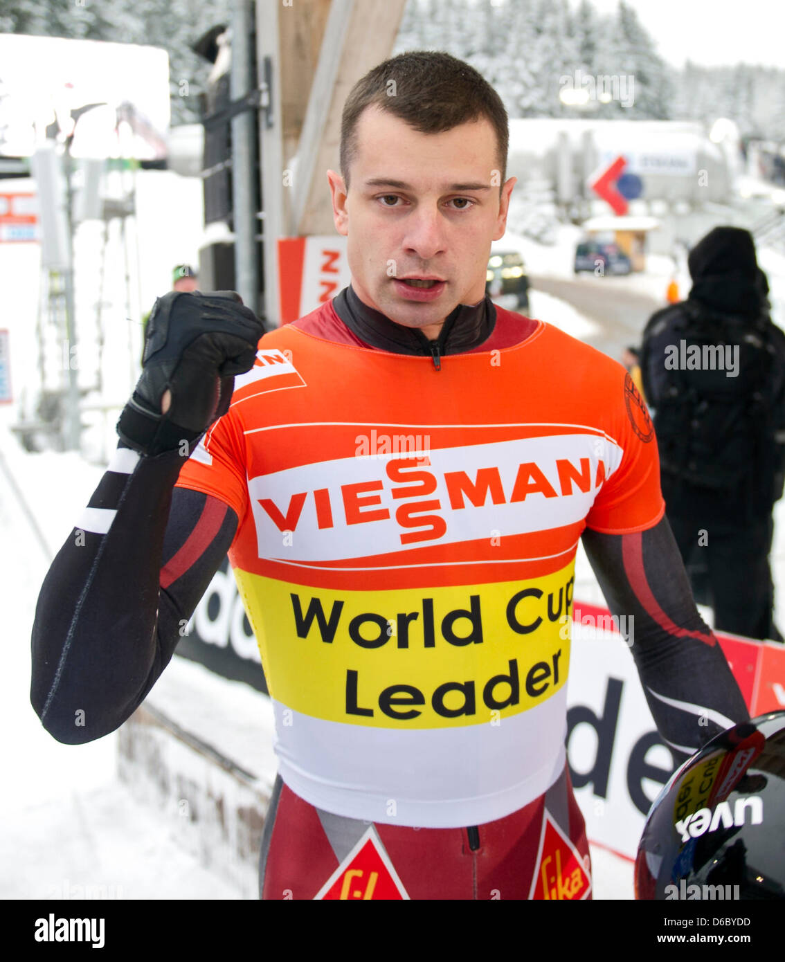 Latvian skeleton pilot, Martins Dukurs, cheers after winning the ...