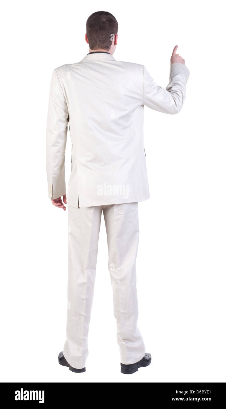 back view of Business man pointing. Young guy in white suit. Rear view ...