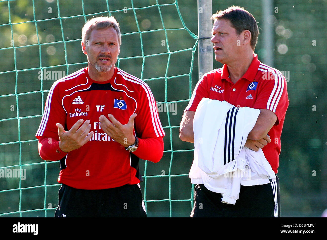Head coach Thorsten Fink (L) and sports director Frank Arnesen of the ...