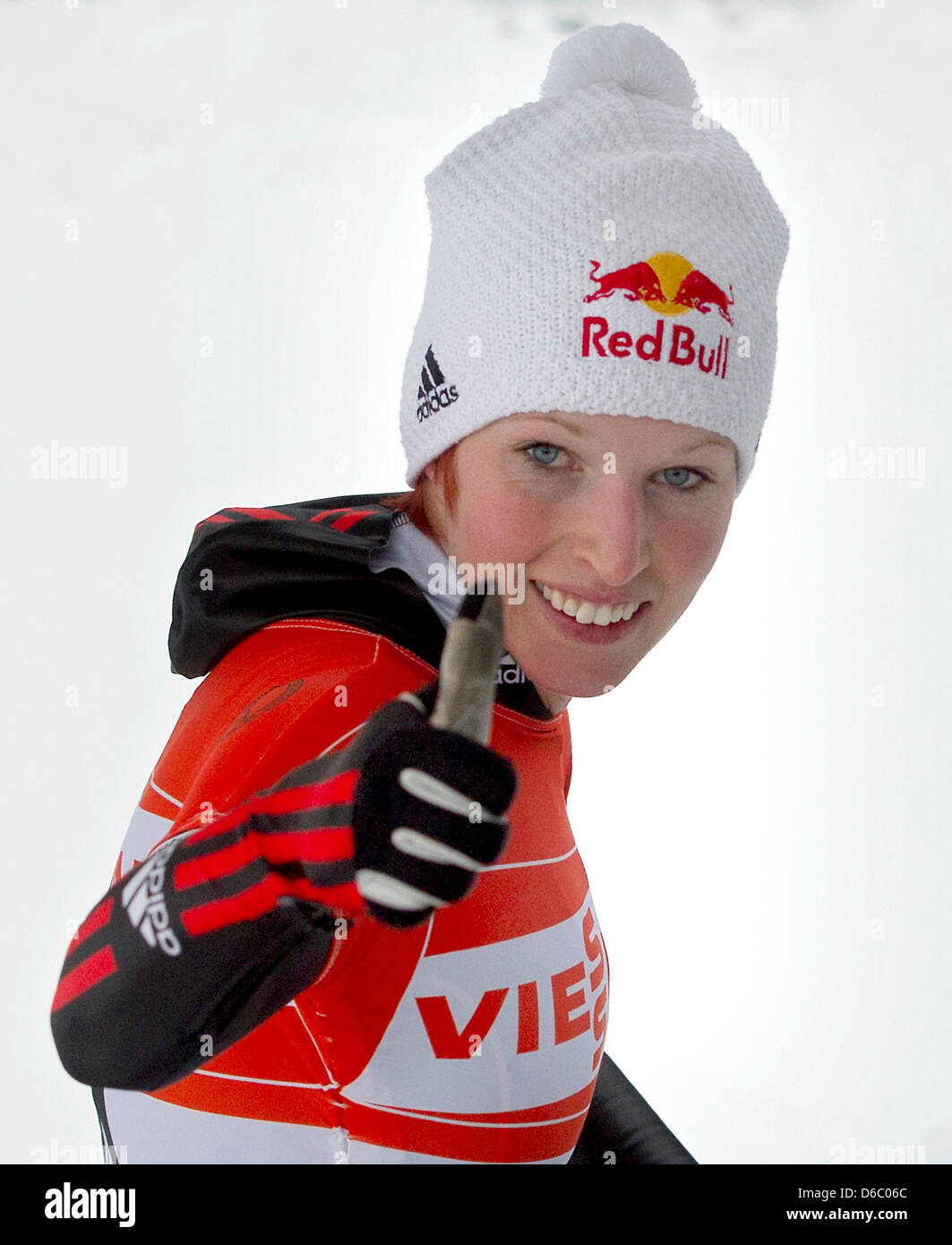 German skeleton pilot Anja Huber celebrates her victory at the finish ...