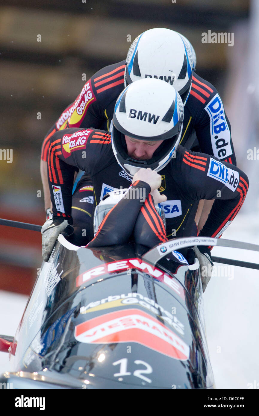 Bob pilot Maximilian Arndt and his pushers Alexander Roediger, Marko ...