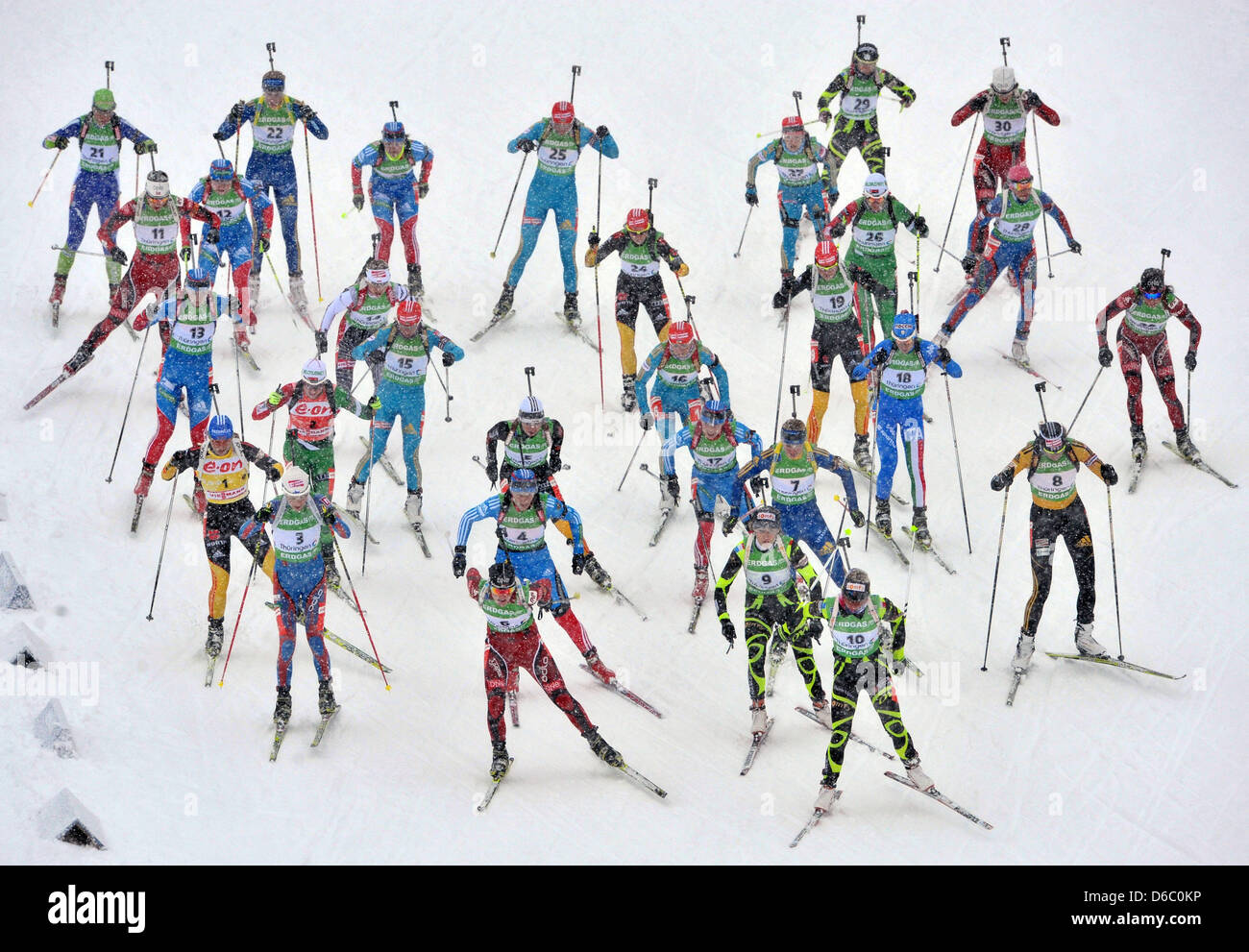 The biathletes start the women's 12.5 kilometres mass start event at ...