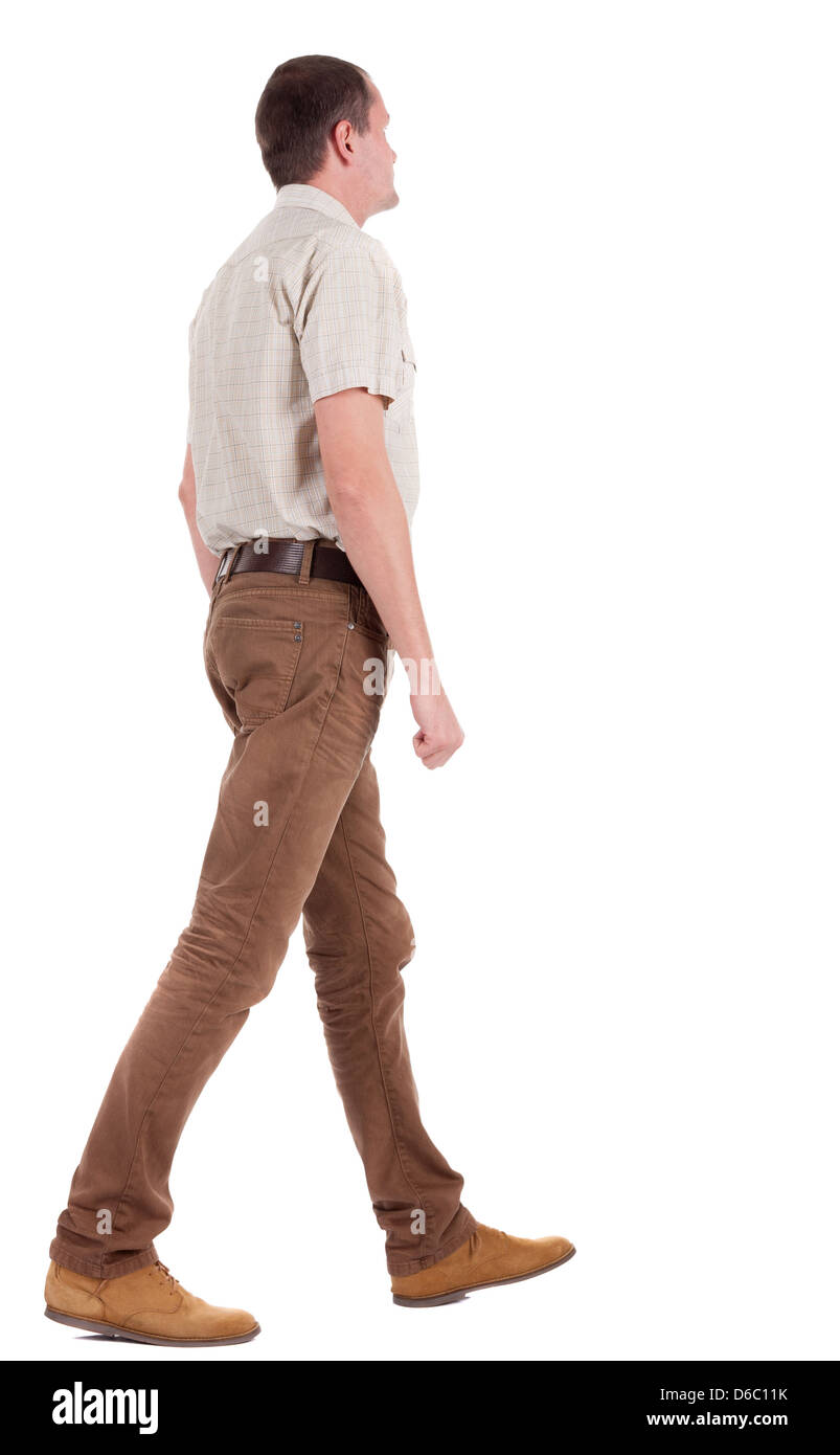 Back view of going handsome man in jeans and a shirt. walking young guy ...