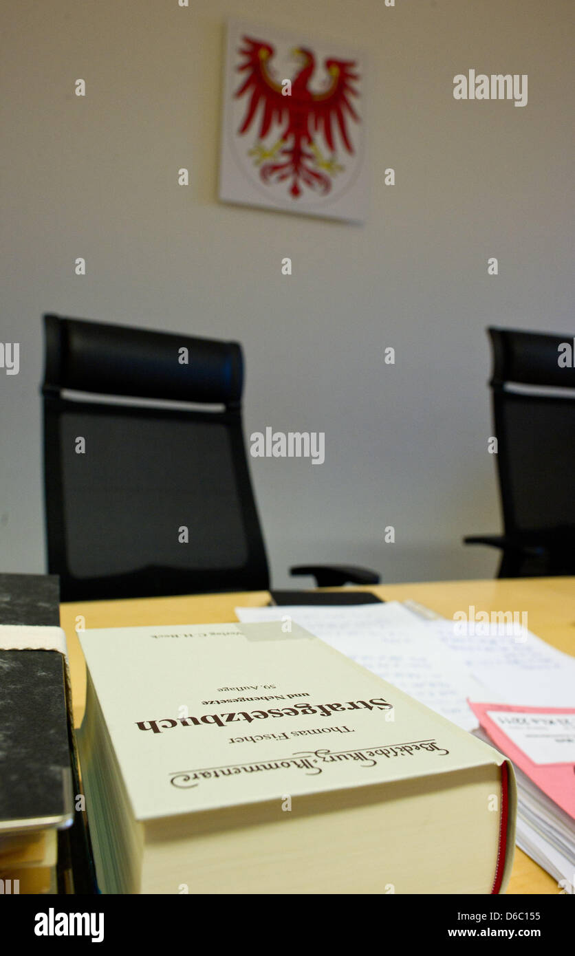 The penal code and binders lie on the judge's table prior to the new ...