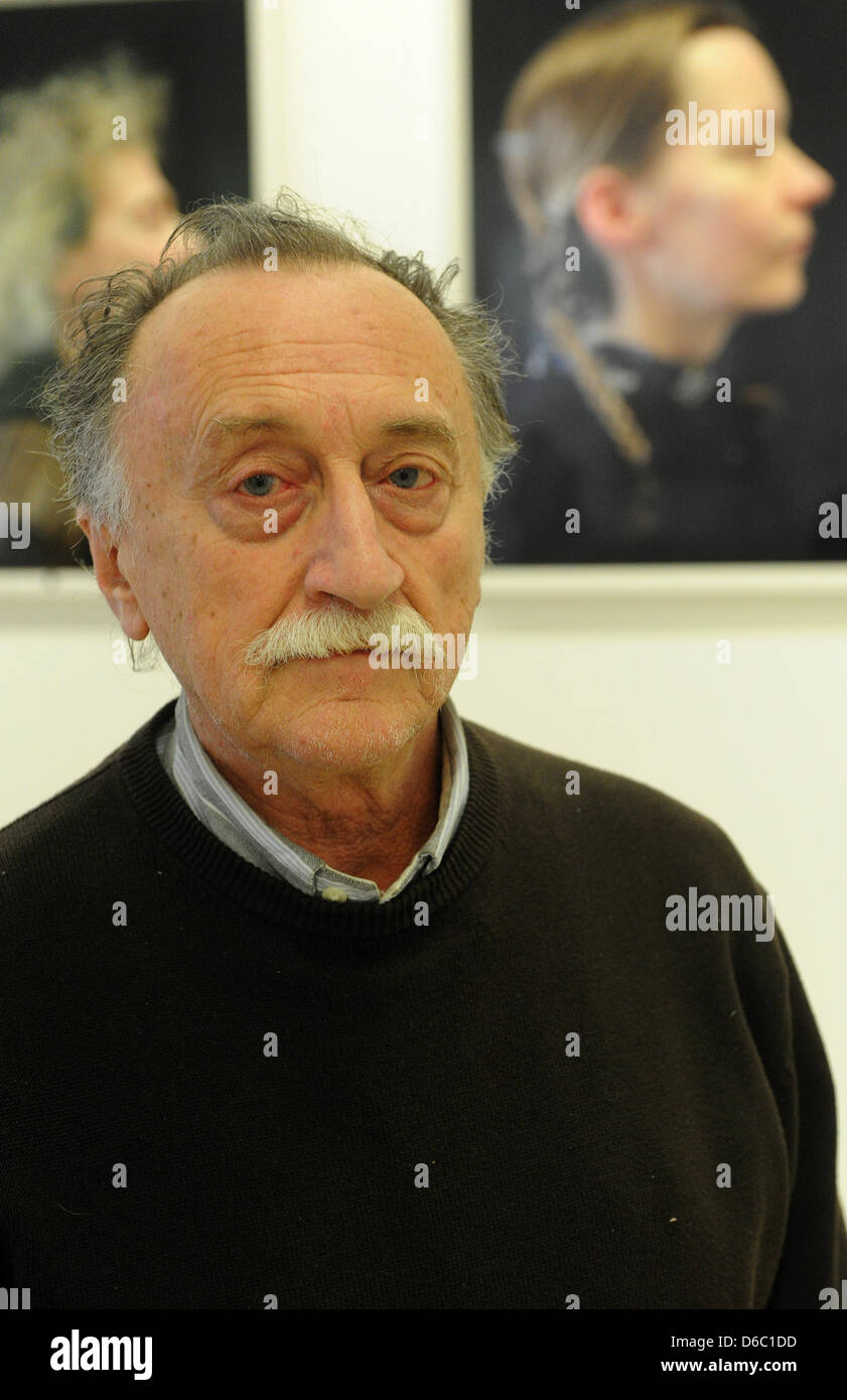 Photographer Boris Mikhailov poses in front of his portait series at ...