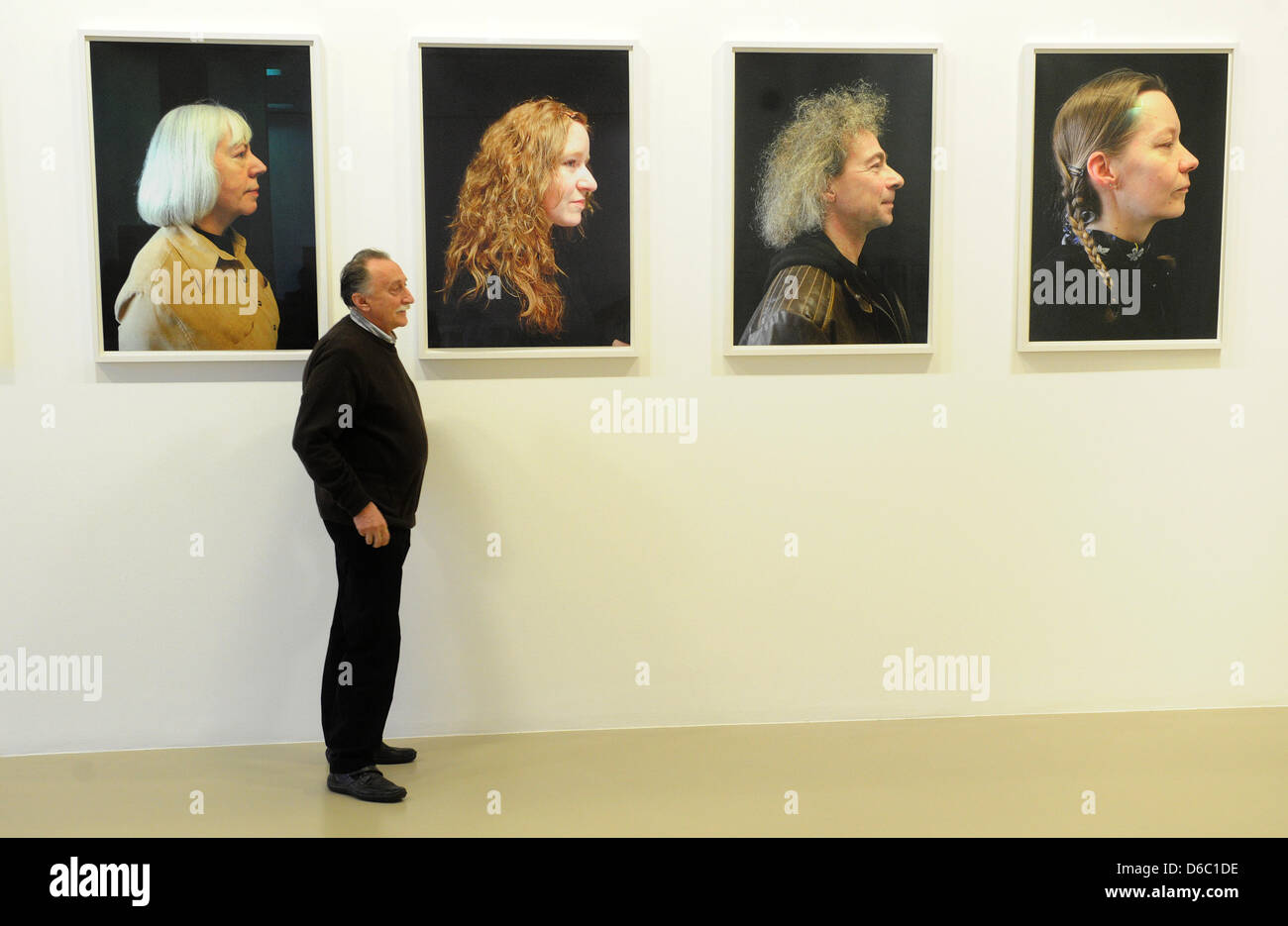 Photographer Boris Mikhailov poses in front of his portait series at ...