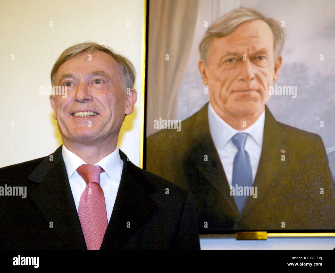 Former German President Horst Koehler poses for a picture next to his ...