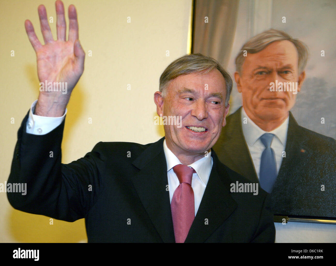 Former German President Horst Koehler poses for a picture next to his ...