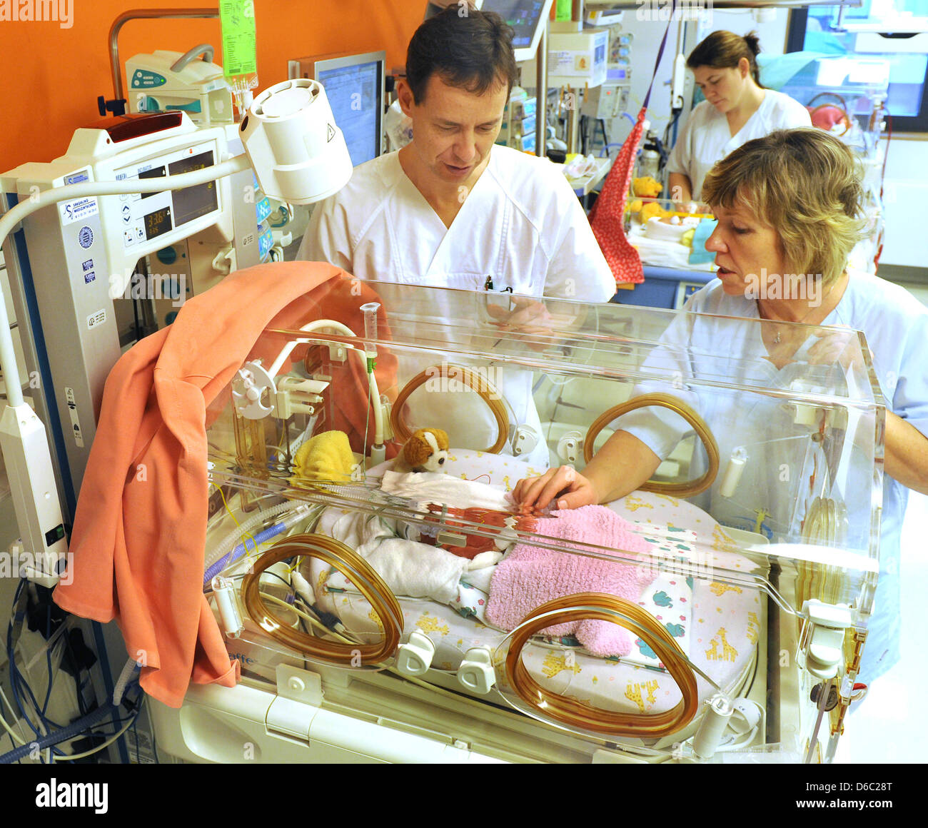 Ward director Prof. Ulrich Thome and nurse Gabi cares for a few weeks ...
