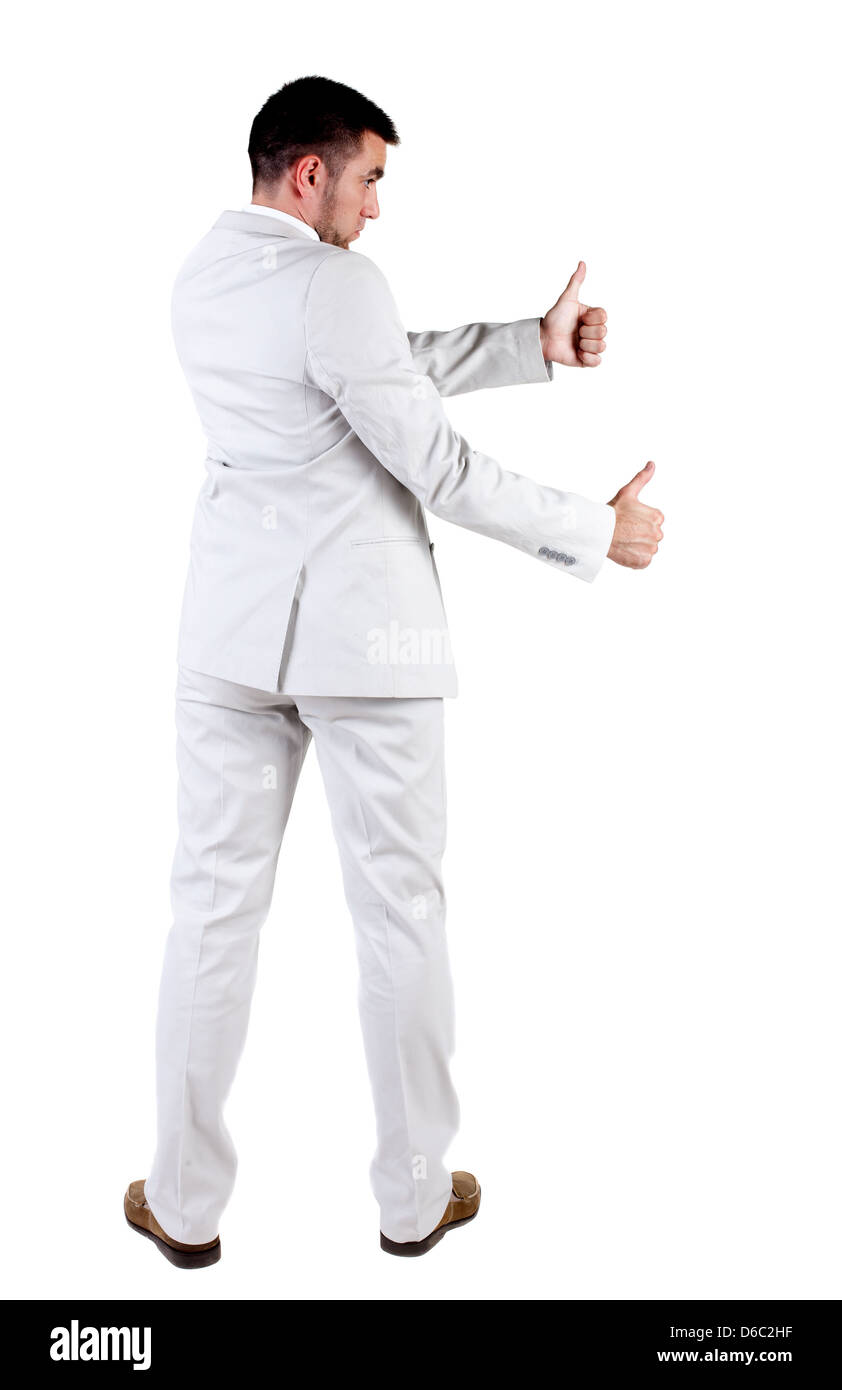 Back view of young business man in white suit going thumb up, isolated ...