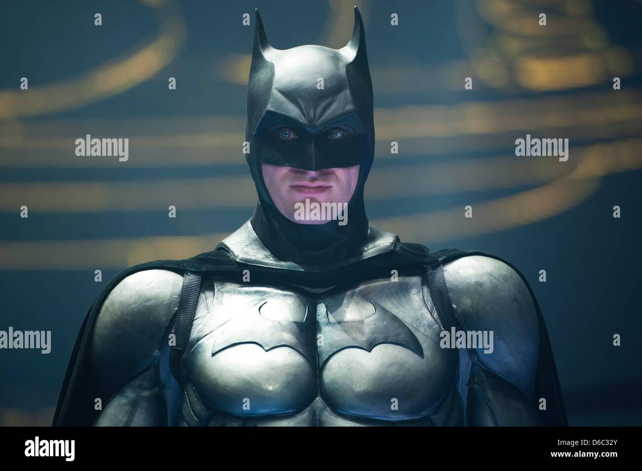 Sam Heughan (R) as Batman poses during the presentation of the stage ...