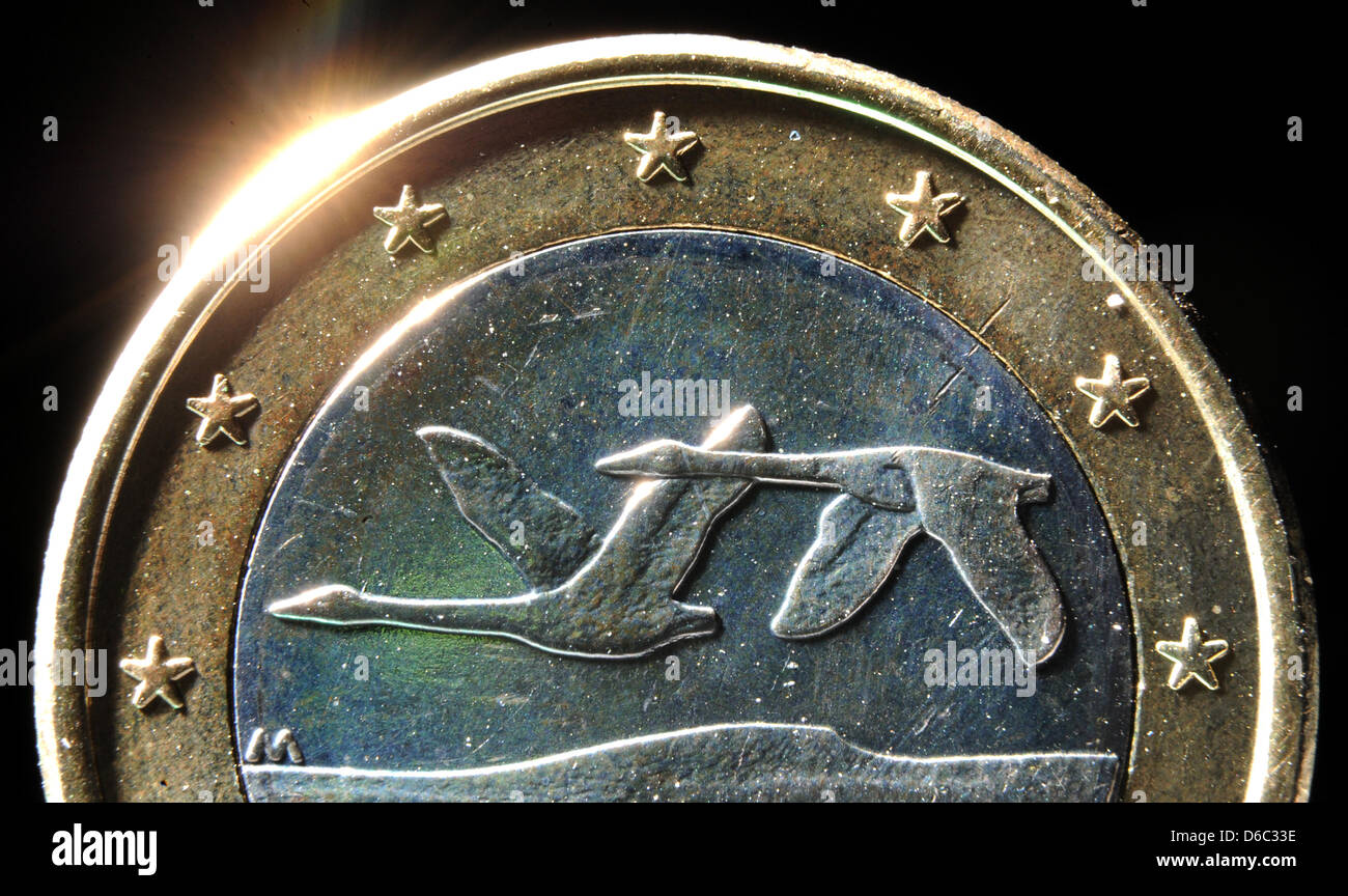 (ILLUSTRATION) A Finnish euro coin with two swans is pictured in ...
