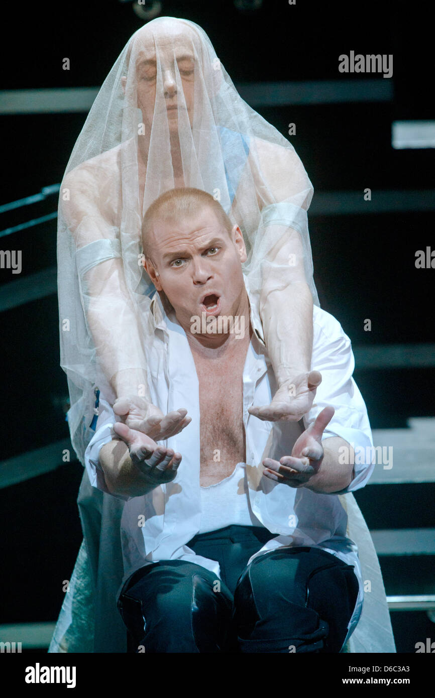 Singer Erwin Leder (back) as 'fool' and Bo Skovhus as 'Lear' perform during a rehearsal of the ...