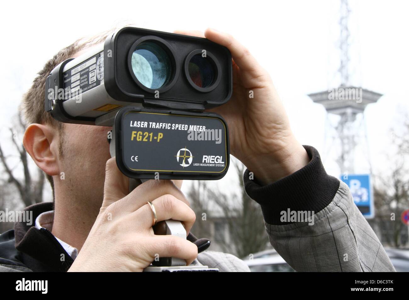 An employee of the traffic service of the Berlin police looks through a ...