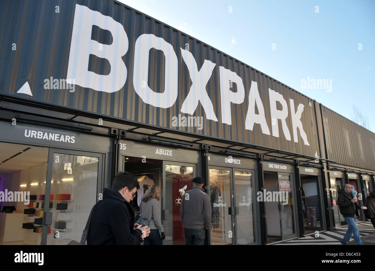 Visitors walk through the lower part of 'BoxPark' in the Shoreditch ...