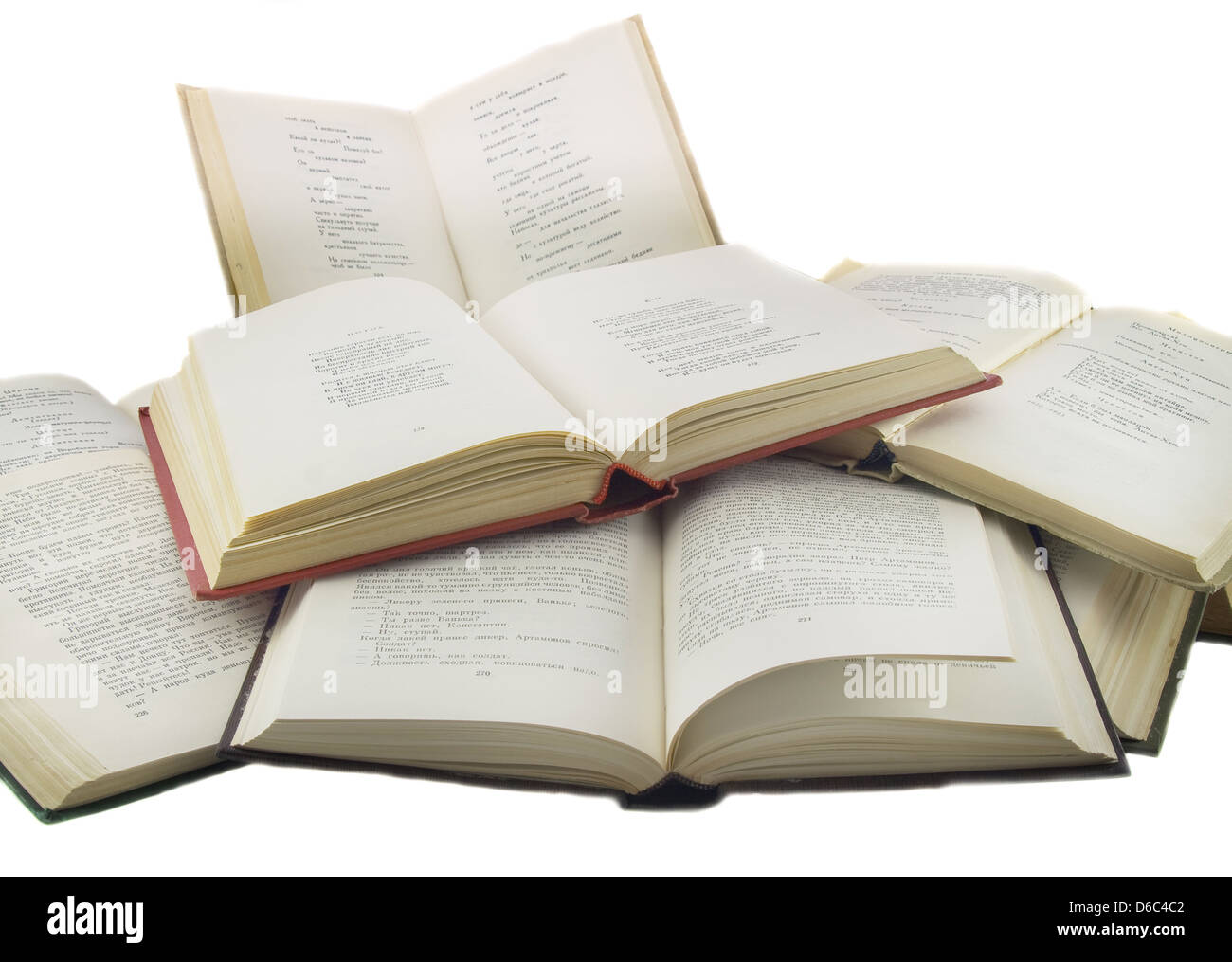 Many open books isolated over white Stock Photo - Alamy