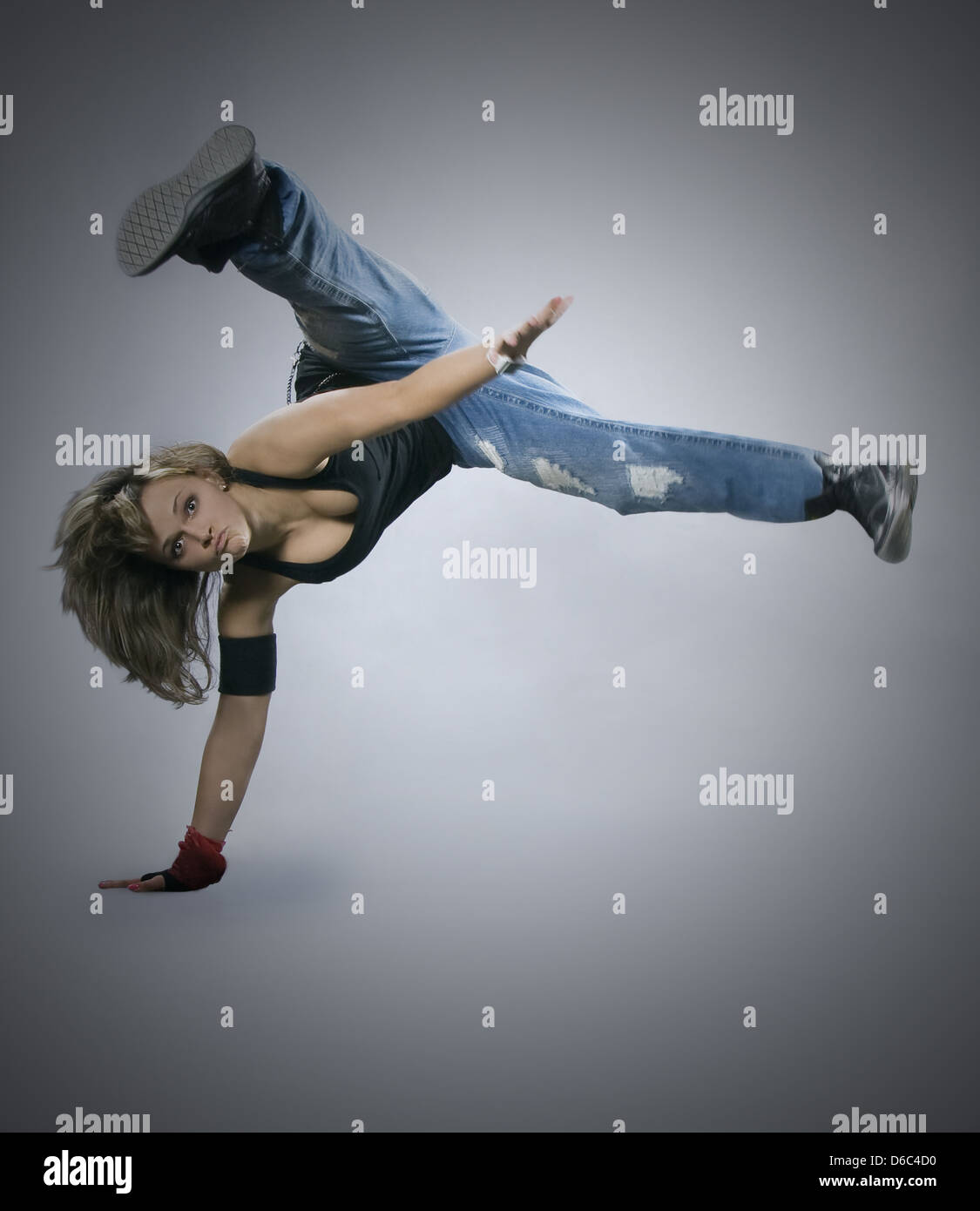 Teenage girl dancing breakdance in action Stock Photo - Alamy